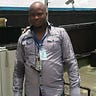 Ailoje John Ojo – Medium