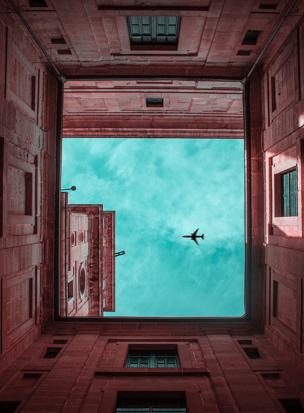 Inconsequentially Yours. Far above the rooftops, a jet… | by Pamela J ...