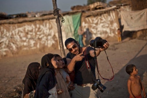 He is a two-time Pulitzer Prize winning photographer who has travelled ...