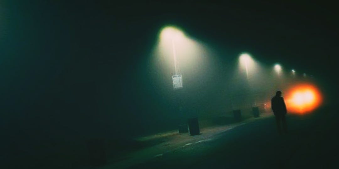 Under street light walking.….. Above dark sky, down baby blue road ...