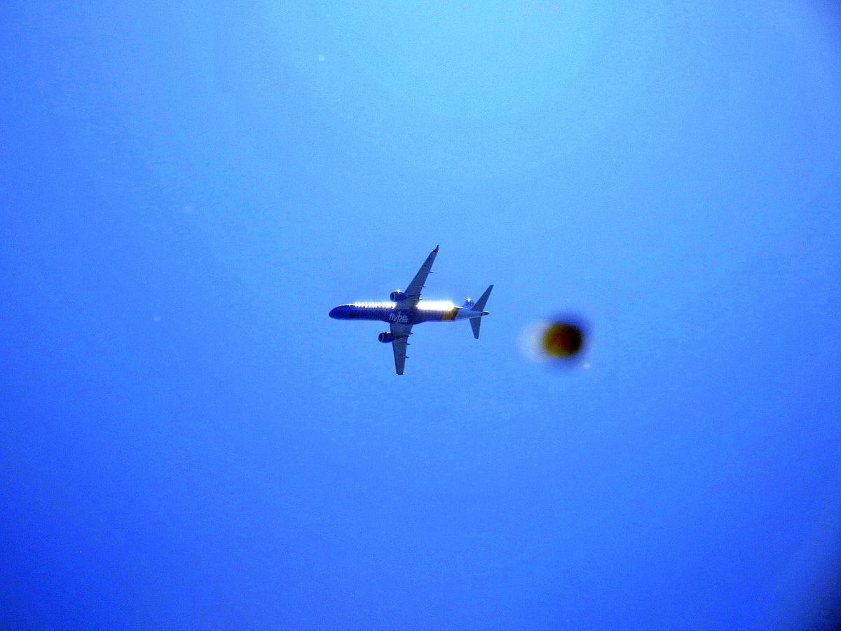 Large Sphere Captured Trailing Behind Passenger Plane By Johnmooner