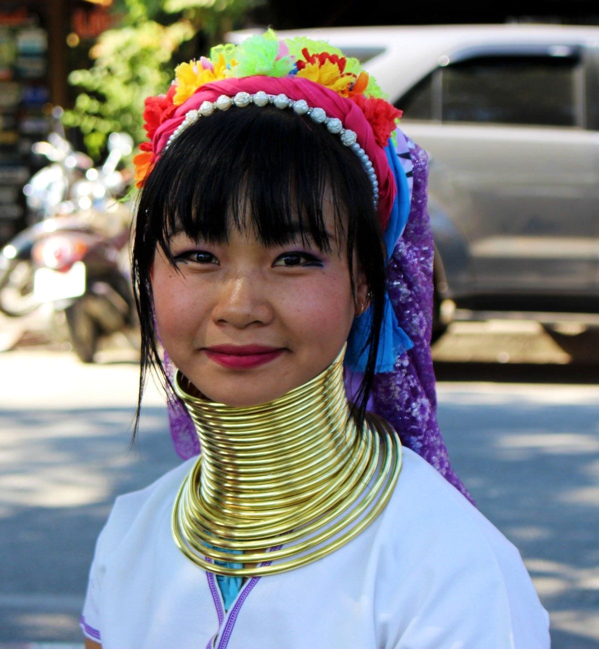 Giraffe Women Bonded to Their Neck Rings - haibun | Genius in a Bottle