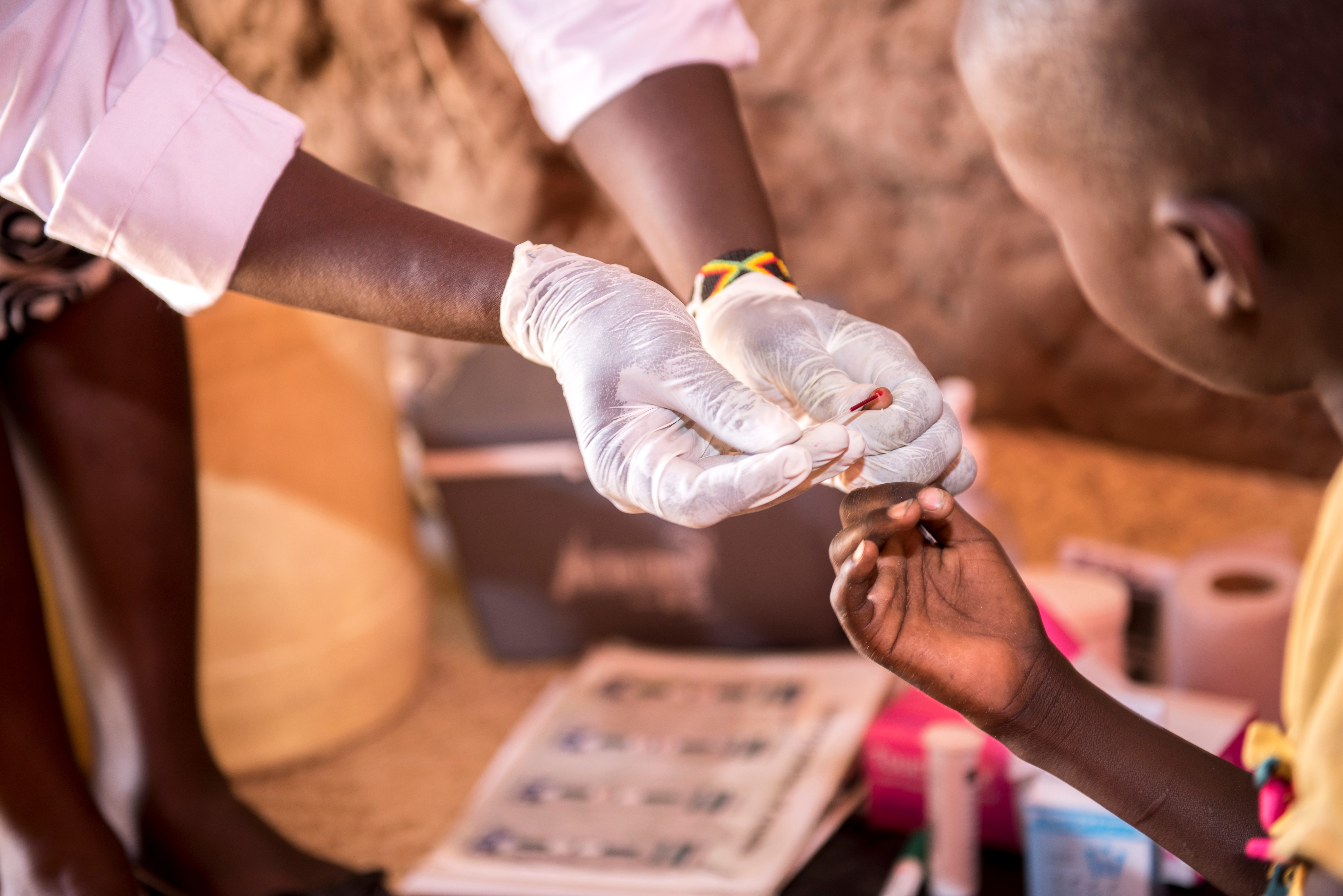 Rapid HIV Testing in a Manyatta. It’s 107 degrees Fahrenheit at midday ...