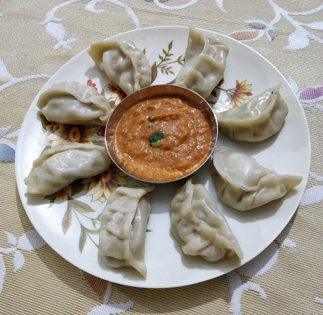 Chicken Momo. Chicken Momo is a non vegetarian dish… | by Plate Of ...