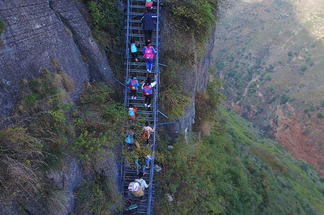 For 200 years, these villagers lived 2,600 feet up a remote cliff. Now ...