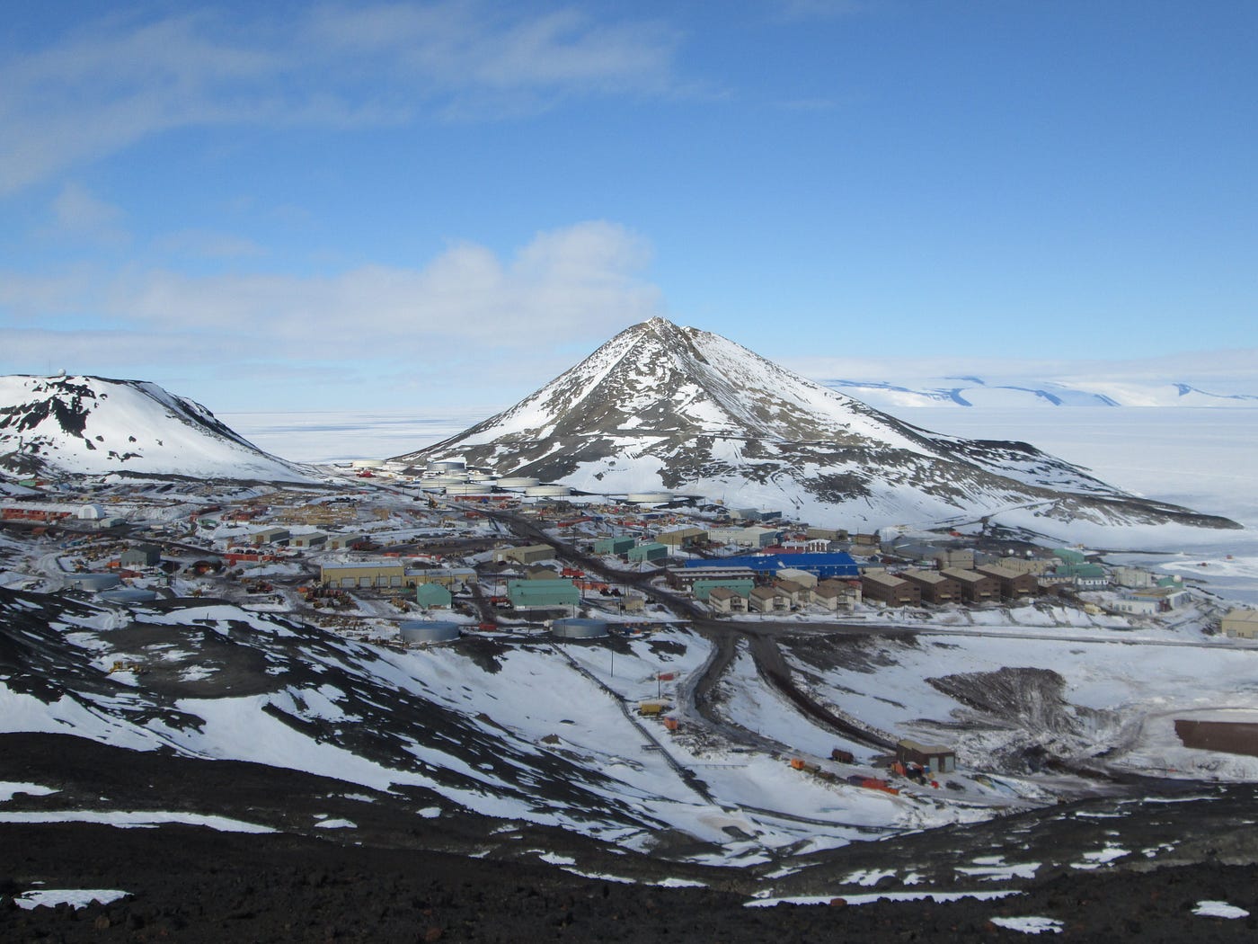 Hiking in Antarctica. The mountains in the distance are… | by Sean ...