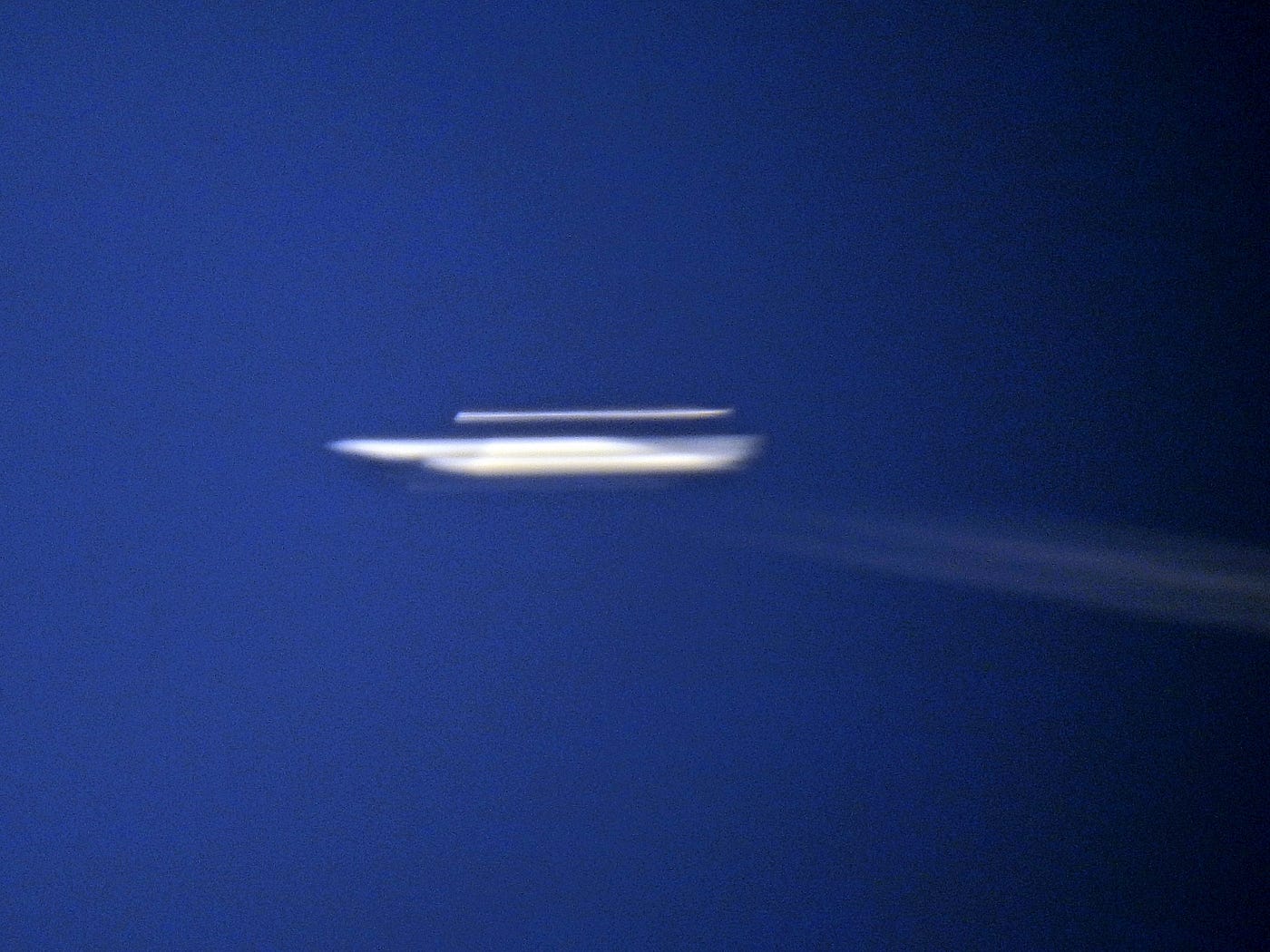 Four White Cigar Shaped UFOs Captured, | by Johnmooner-chief | Sep ...