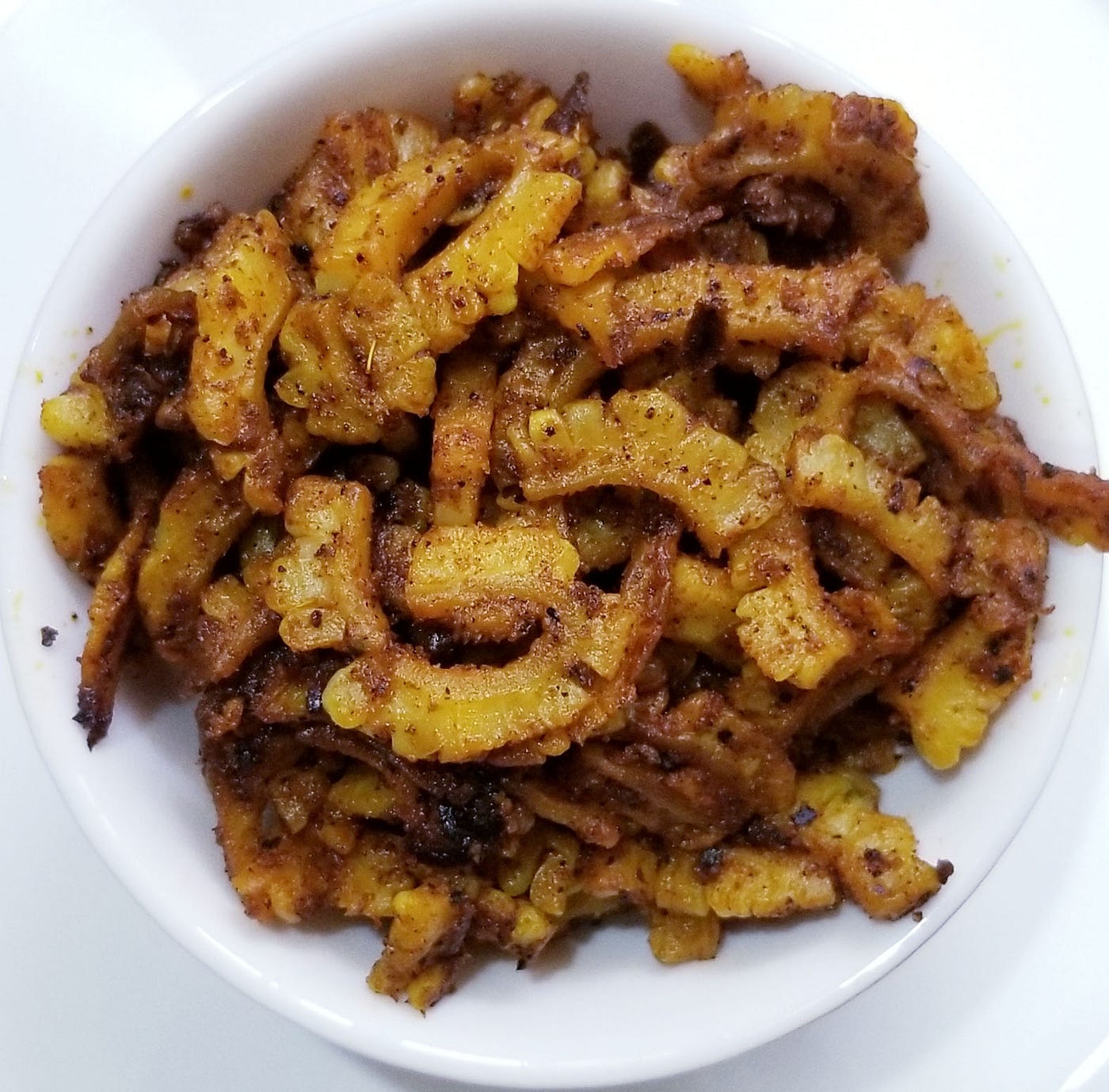 Pavakkai Fry | How to make Bitter Gourd Fry | by Harini's Kitchen | Medium