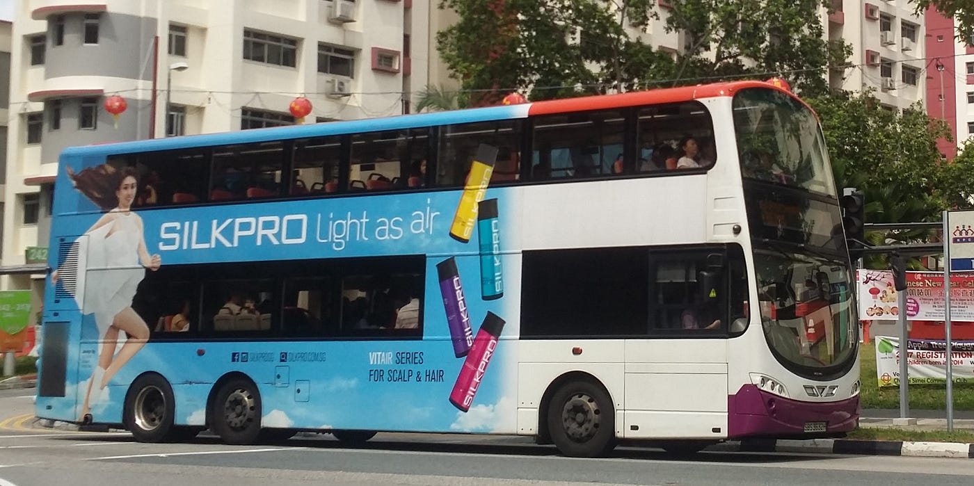 The eyesore that is new bus advertisements | by Ryan © | Medium