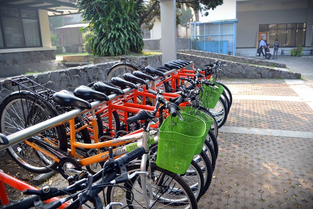 Bikes in Campus. How $200/student can speed up travel… | by Iqbal Hakim ...