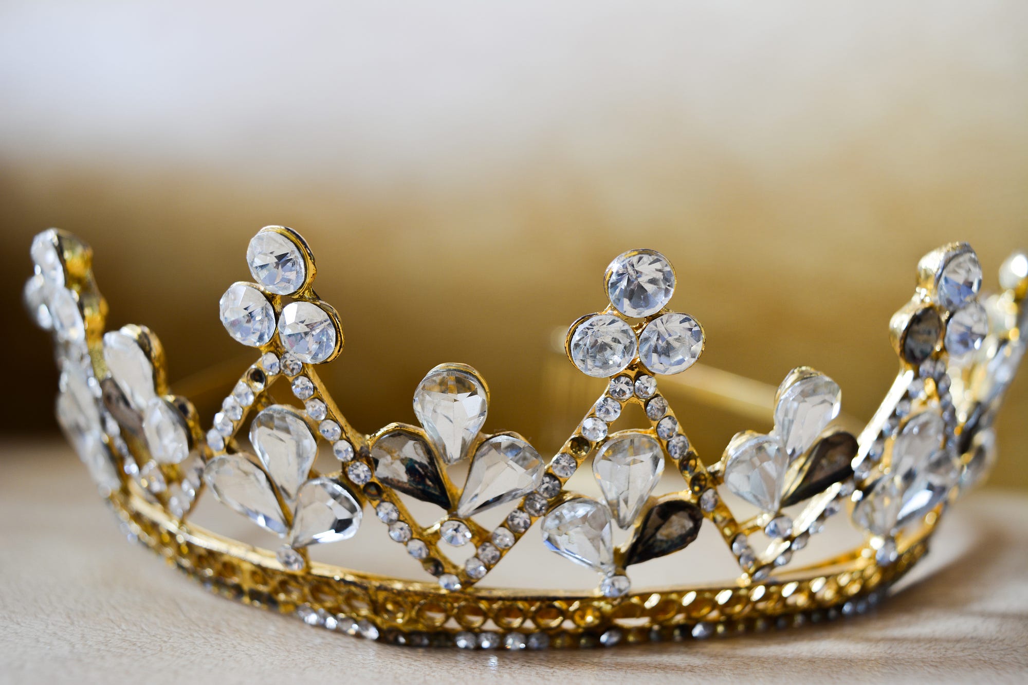 A Crooked Crown. The chandeliers swung elegantly to the… | by Kam | The ...