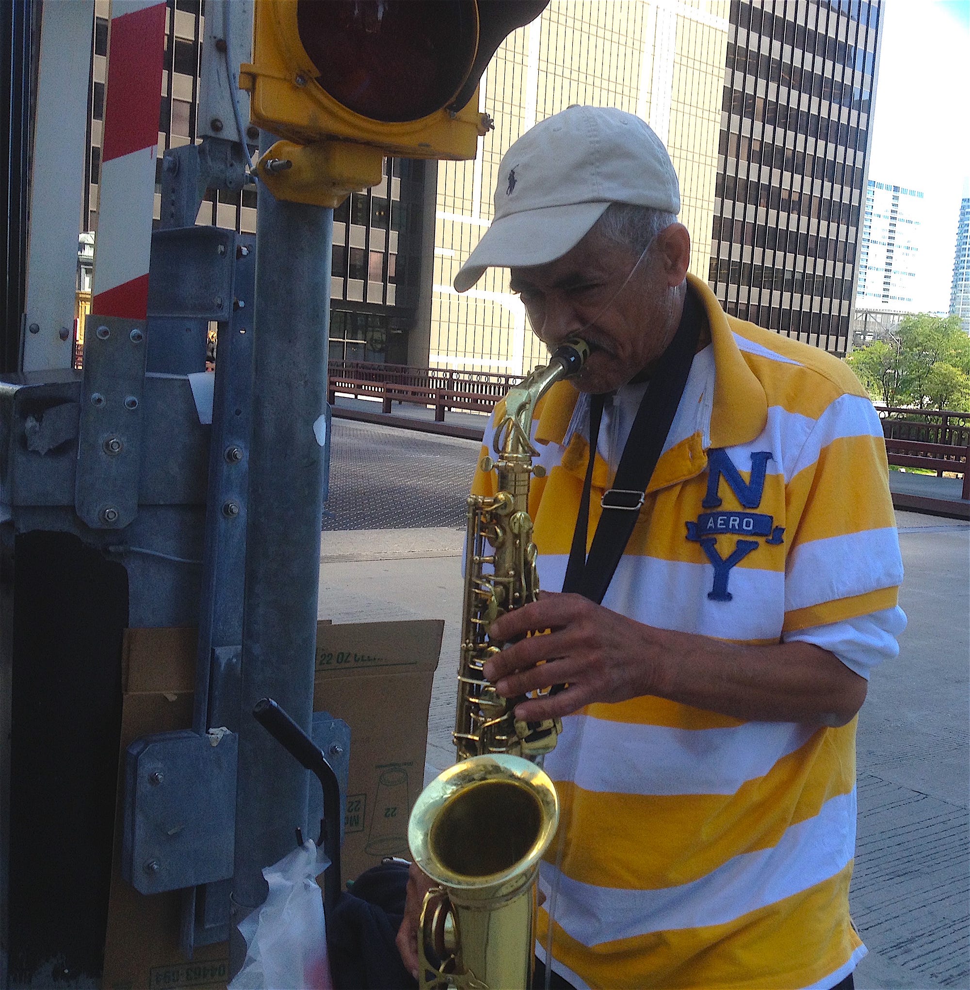 The Saxophone player on the Jackson Street Bridge | by Reminiscences of ...