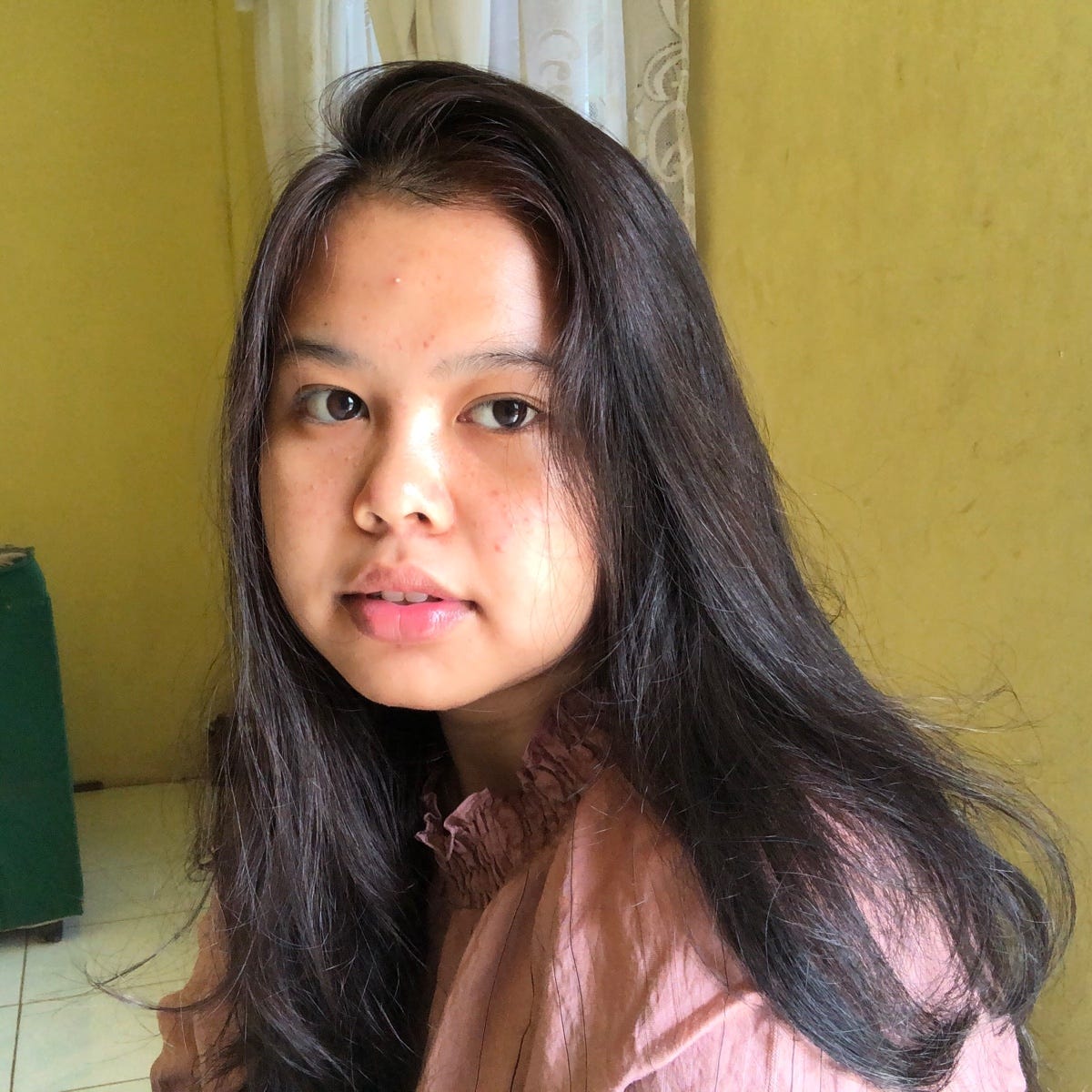 Rheina Sebayang – Medium