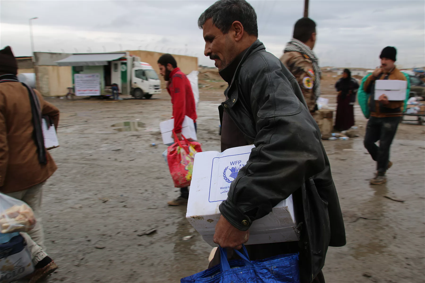 Feeding families out of Mosul. Food provides a lifeline to people… | by ...