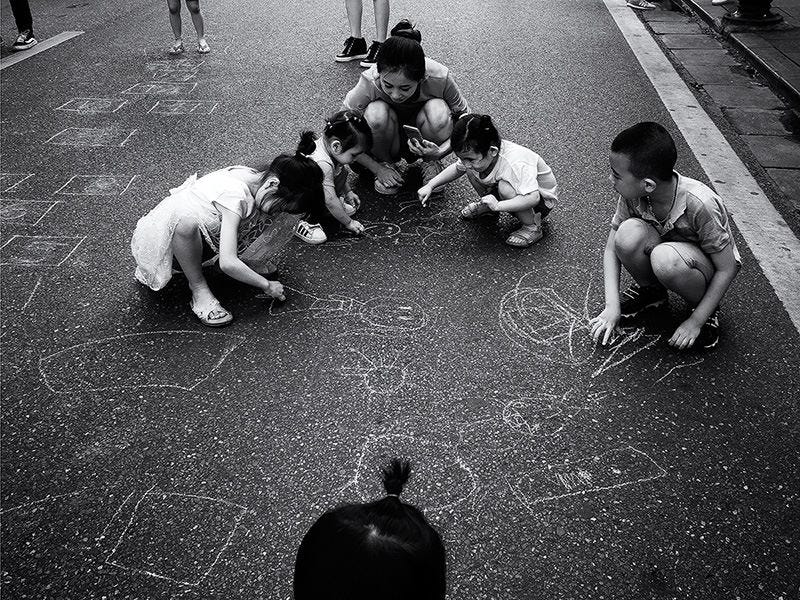 Street Games. Street photography gallery curated by… | by Casey ...