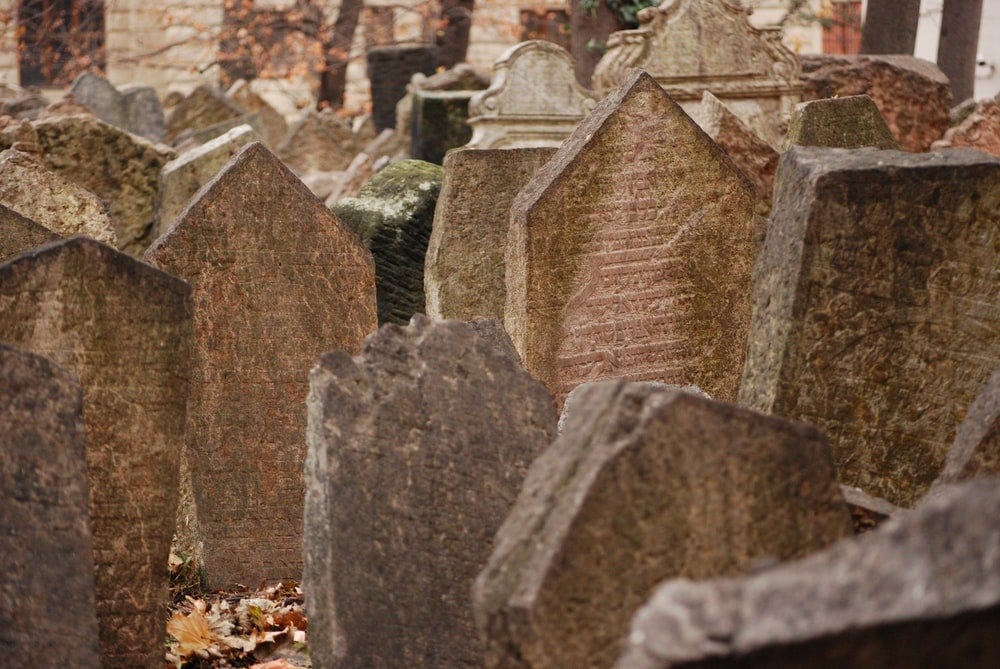 A Tombstone. A slate tooth rises among the rest… | by Iestyn Tudor | Medium