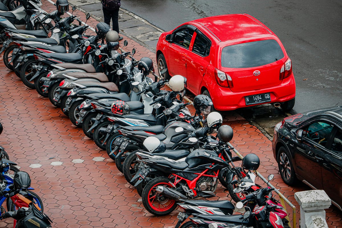 A Polite and Humble Parking Attendant | by Pravda | Medium