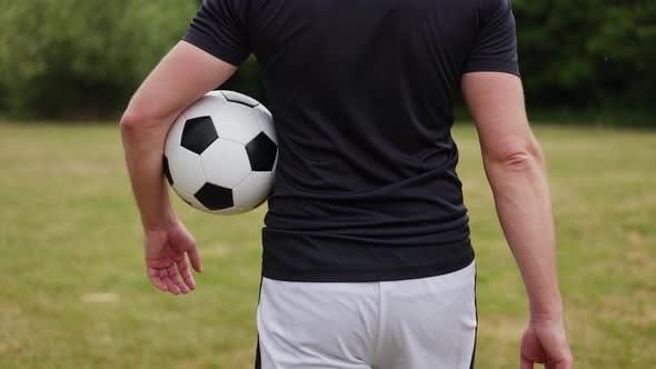 Back View of Adult Male in Good Physical Shape Walking Down with Soccer ...