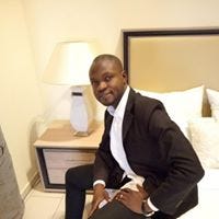 Ola Adebola – Medium