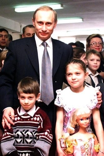 Putin kisses children. 2000 | by Andrii Boboshko | Medium