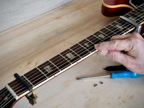Guitar Maintenance: How to Fix a Bowed Guitar Neck | by Guitarmetrics ...