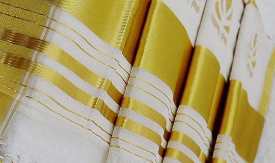 A DRAPE THROUGH TIME: UNVEILING THE HISTORY OF TRADITIONAL KERALA ...