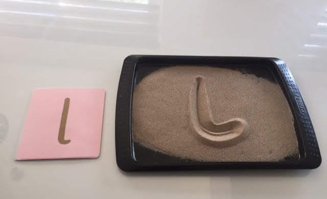 The Sand Tray. The child traces the letters on dry &… | by Roberta ...
