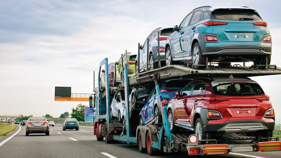 Understanding the benefits of enclosed car carrier trucks in car ...