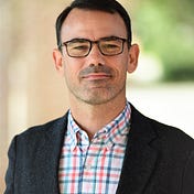 Dr. Tim Holland – Medium