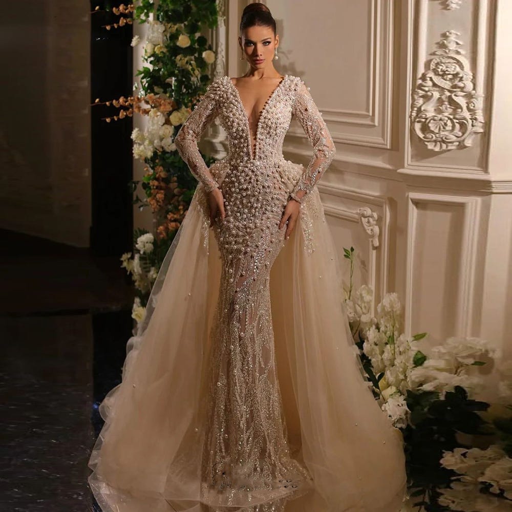 Opulent Elegance: Saudi Arabian Pearl-Adorned Wedding Gown with ...