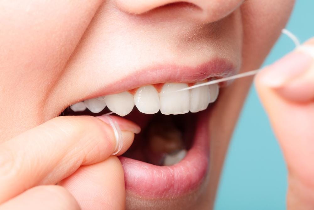 The Negative Effects Of Not Flossing | by Integradentalau | Medium