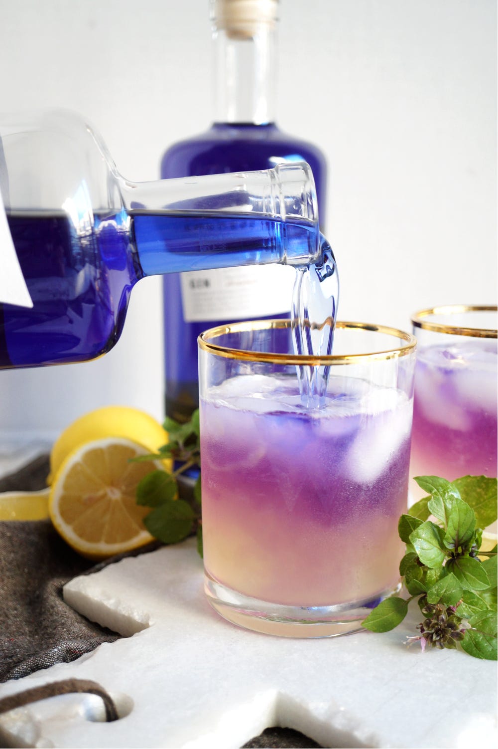 Violet Gin Fizz. The Violet Gin Fizz is a captivating… | by Los Foodies ...