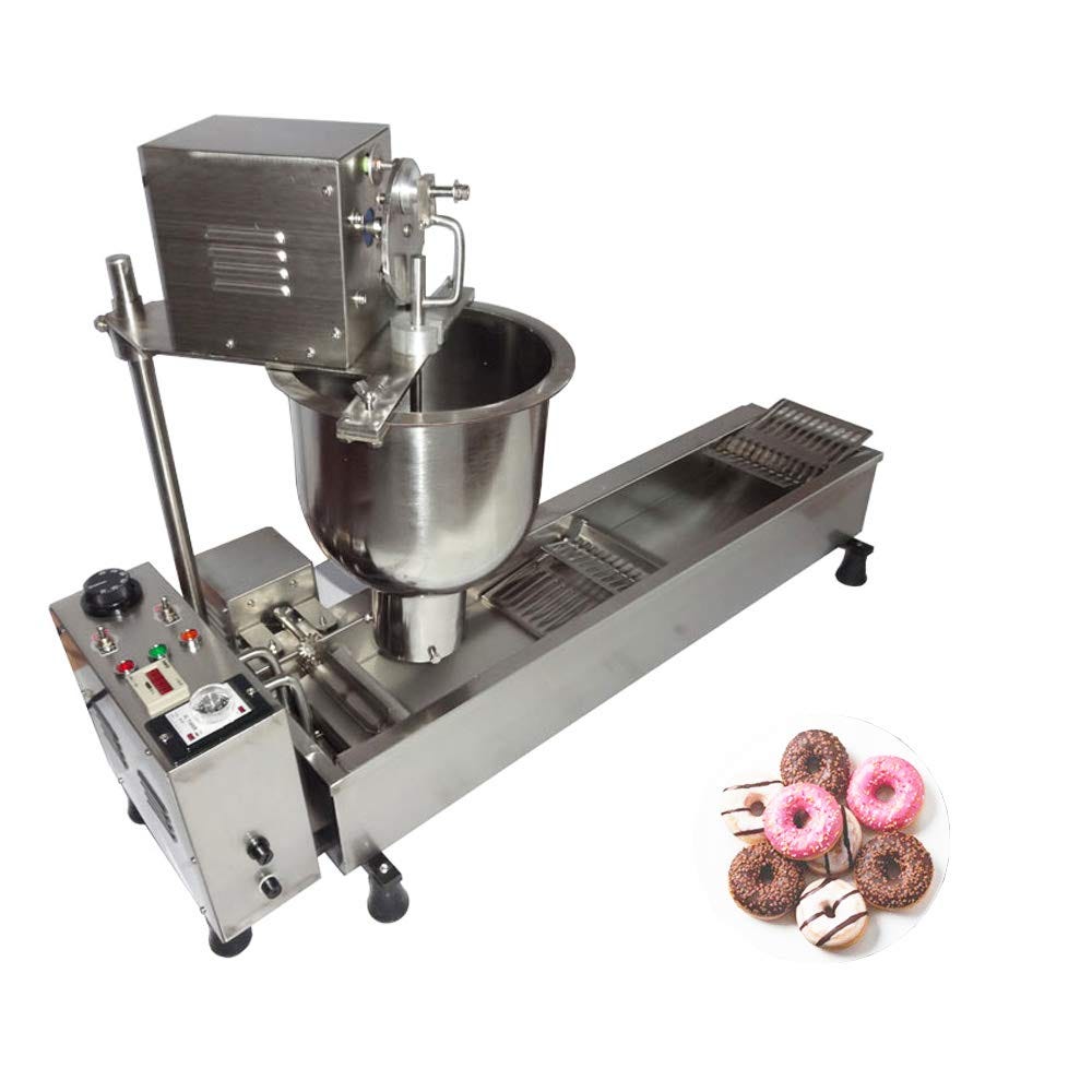 Automatic Donut Making Machine. Donuts, with their delectable flavors ...