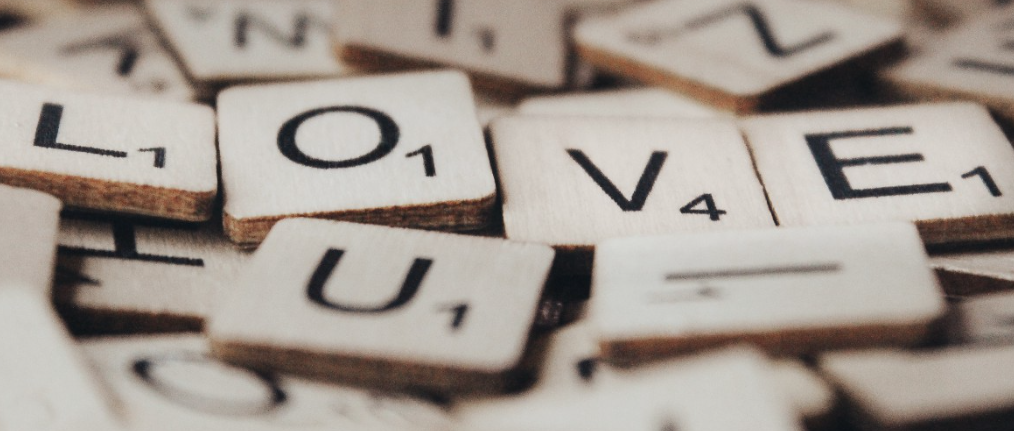Arranging letters on a table, making words if I’m able letters from the ...