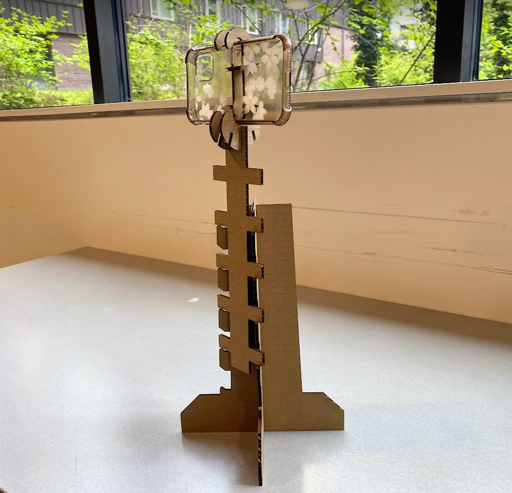 Laser Cut Adjustable Phone Stand. Design | by Ava Lim | Apr, 2024 | Medium