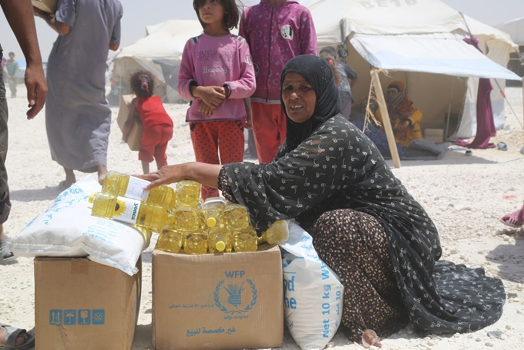 After three years, Syrians in Raqqa receive a lifeline | by Marwa Awad ...