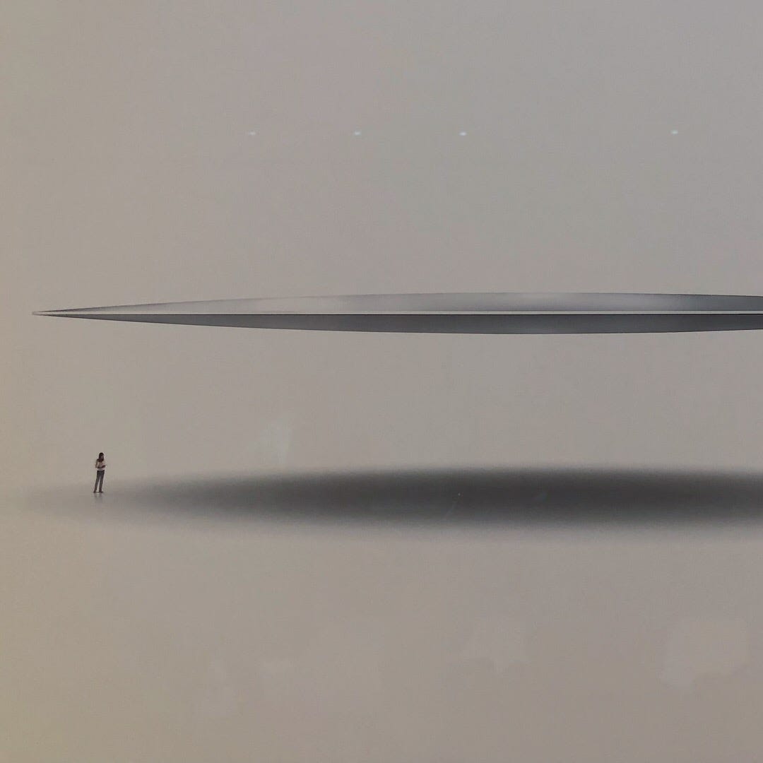 A floating metal disk at the Apple HQ | by Nobuyuki Hayashi林信行 | Medium
