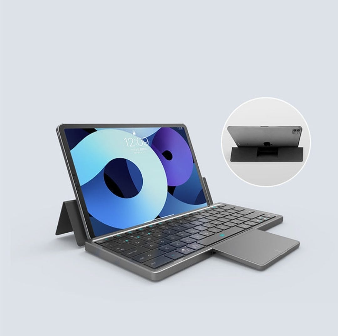 This New Compact BT Keyboard Has A Concealable Touchpad | by ...