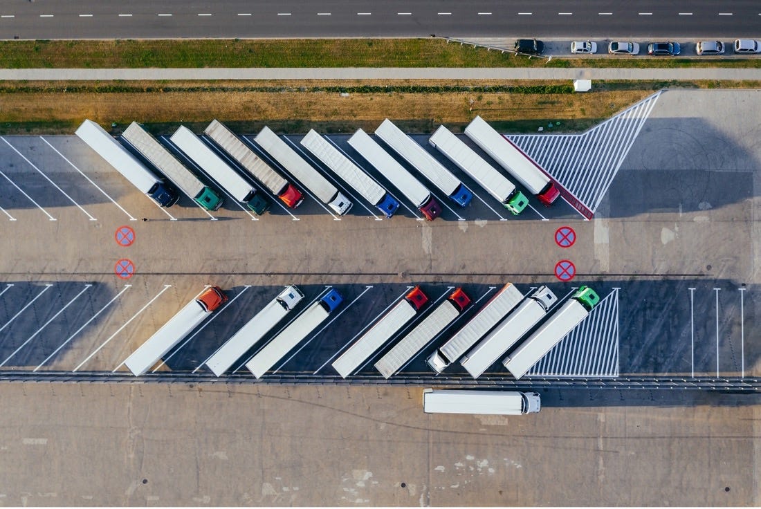 Holistically Solving Vehicle Routing and Container Loading Problems for Middle Mile Grocery ...