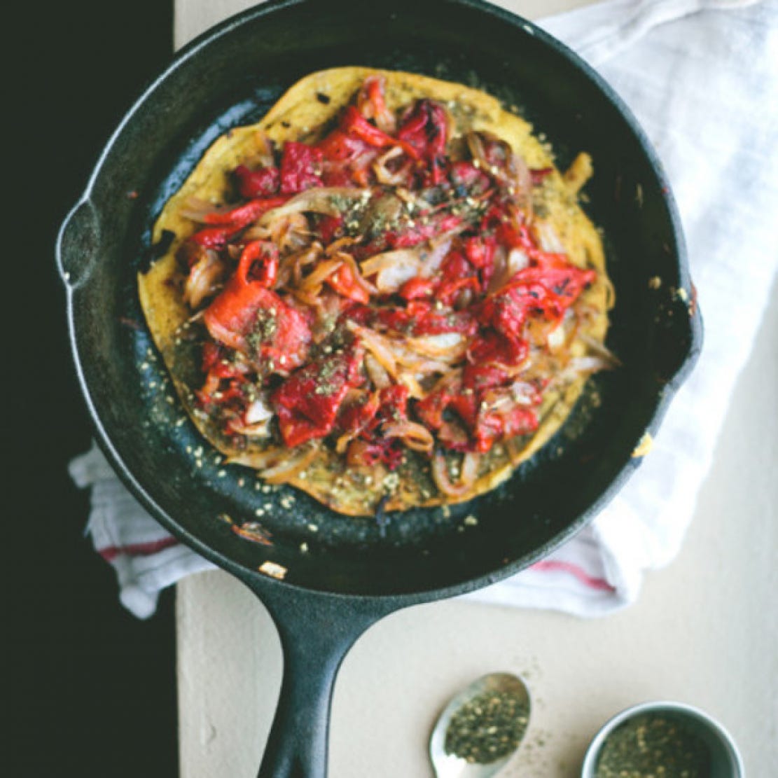 chickpea skillet cake with za’atar, caramelized onions, and roasted red ...