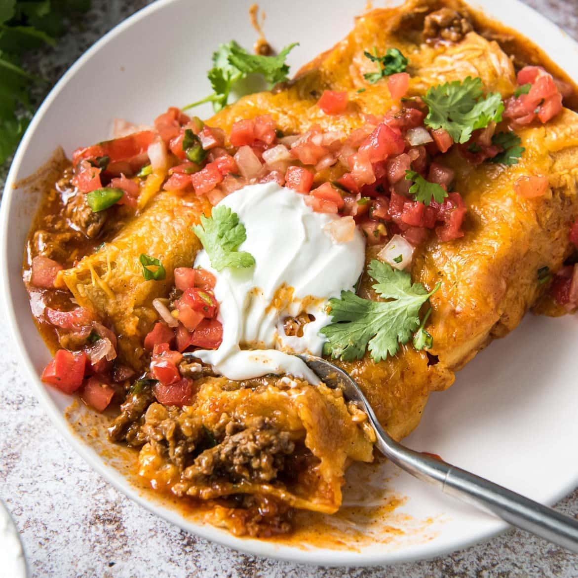 Say ‘Hola’ to Flavor with These Deliciously Simple Mexican Enchiladas ...