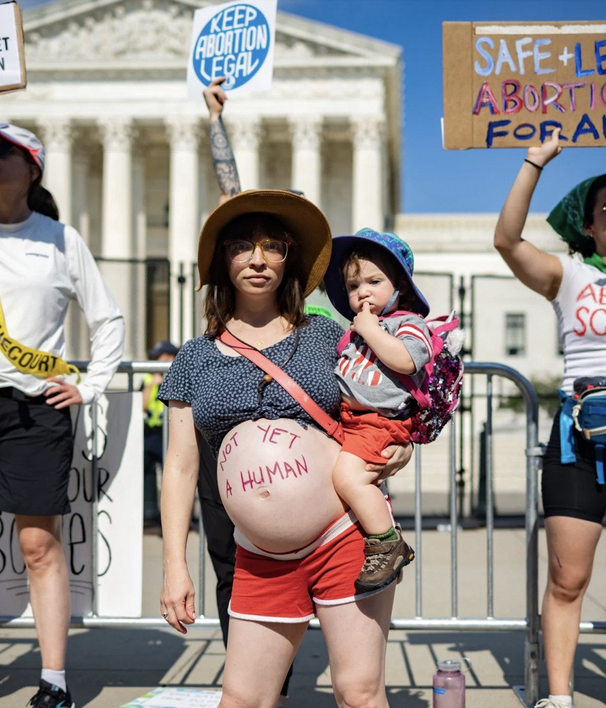 The Thing Growing Inside the Pregnant Woman | by Amy Wooley | Medium