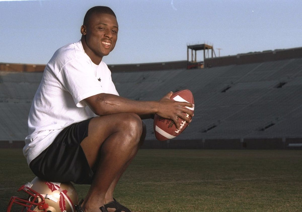 How NFL Great Warrick Dunn’s Past Inspired Him To Give Away Homes To ...