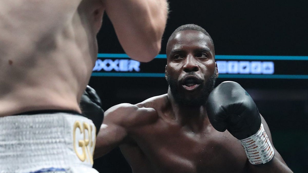 Lawrence Okolie defends WBO world cruiserweight title but tough David Light goes the distance ...
