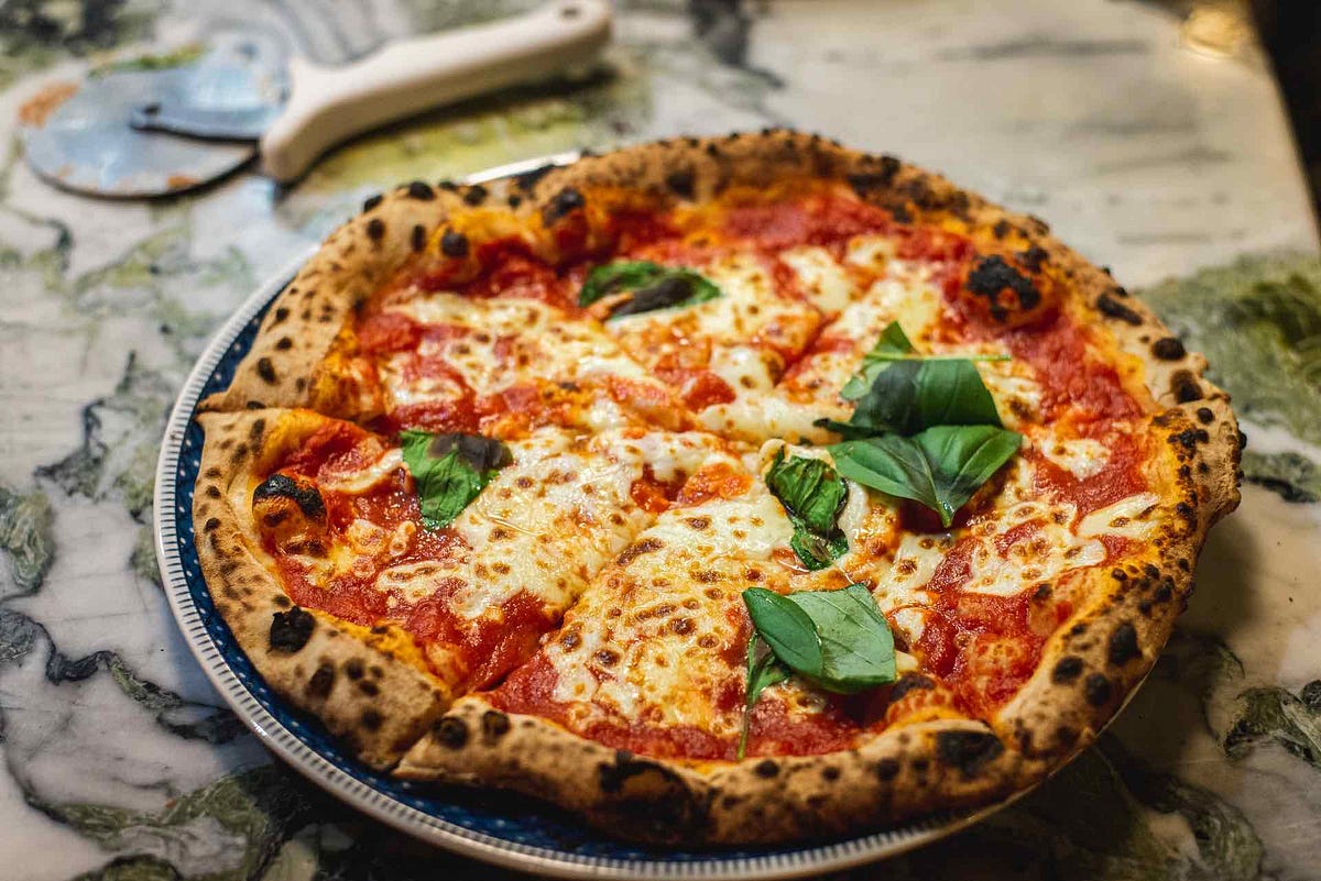 The Evolution of Pizza: A Delectable Journey from Ancient Flatbreads to ...