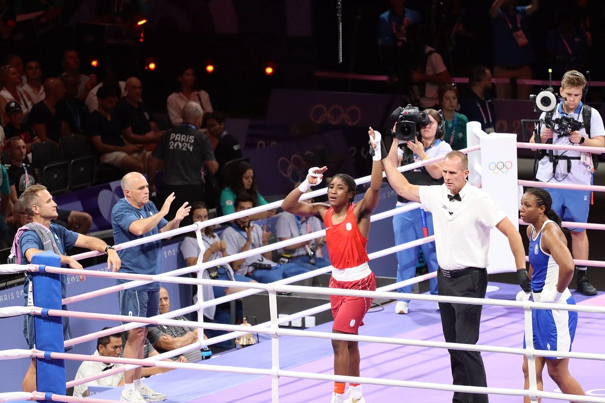 Boxer Cindy Ngamba becomes first athlete competing as a refugee to ...