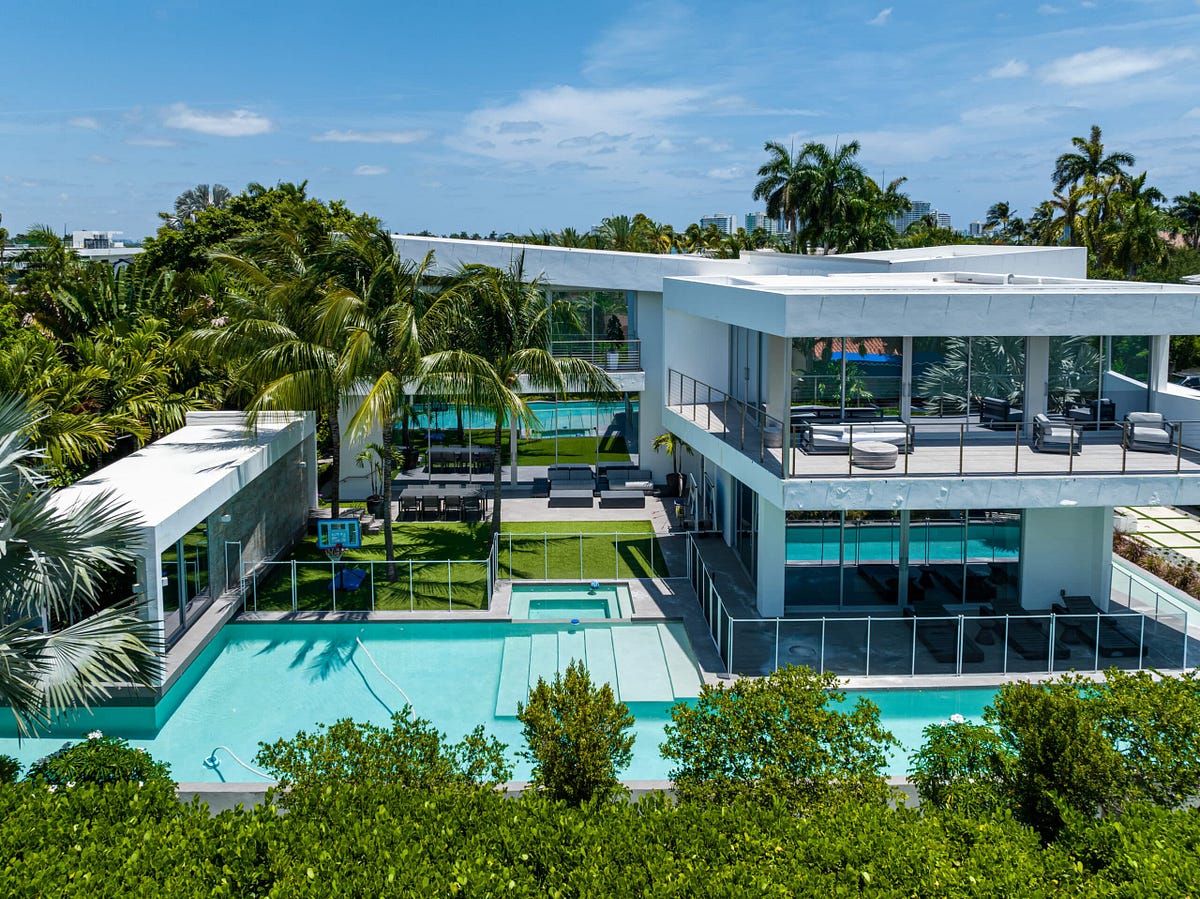 Miami Beach Real Estate News: Waterfront Sunset Islands Mansion Sells ...