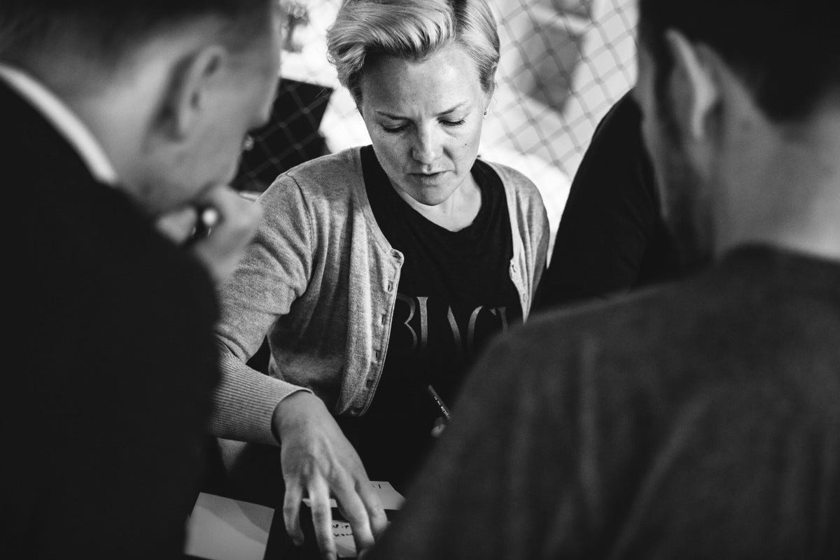 Throwing it over the wall. How what we say can change a team’s… | by ...