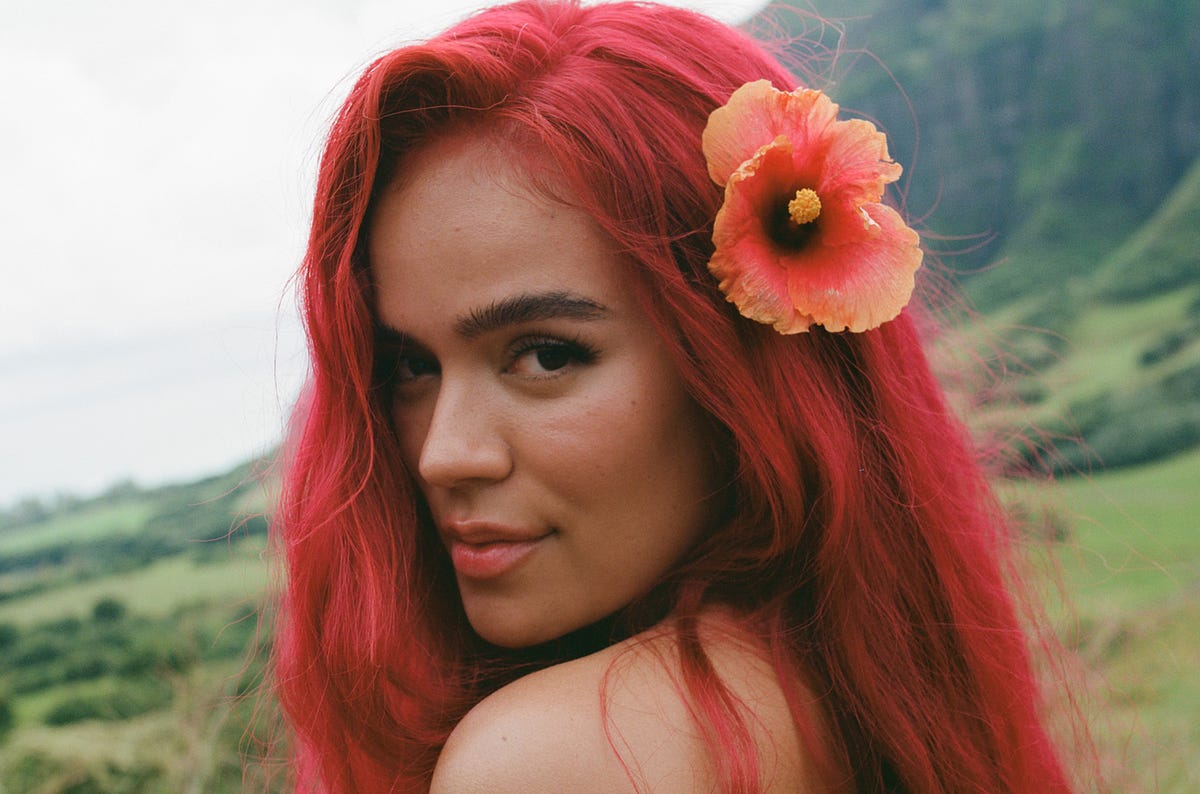 Karol G makes Billboard History, Chris Rock addresses the slap and ...