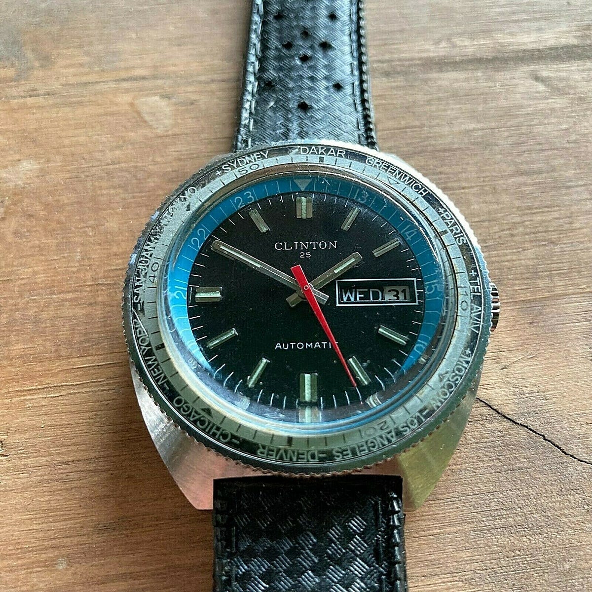 The Price of Vintage Mens Clinton World Time Bezel Automatic Diver ...
